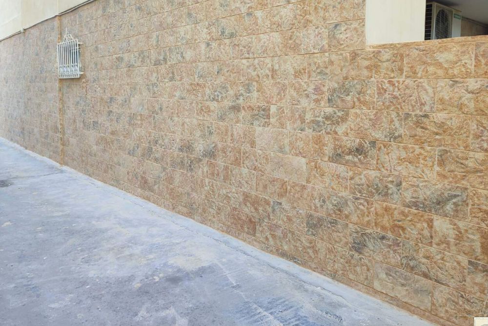 Επένδυση πέτρας σε πολυκατοικία - LysigiaYgrasia.gr