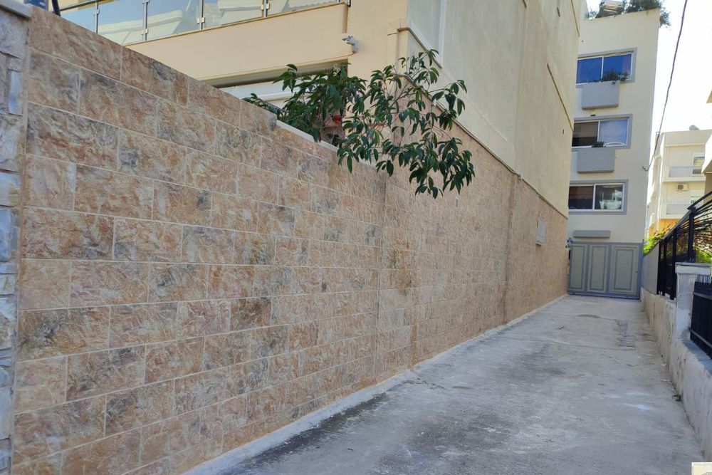 Επένδυση πέτρας σε πολυκατοικία - LysigiaYgrasia.gr